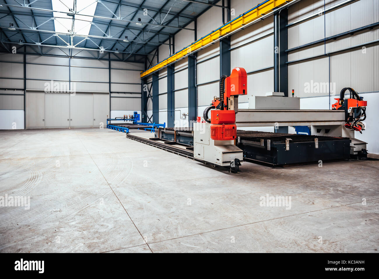 CNC Plasma cutter machine in big metal industrial hall Stock Photo - Alamy
