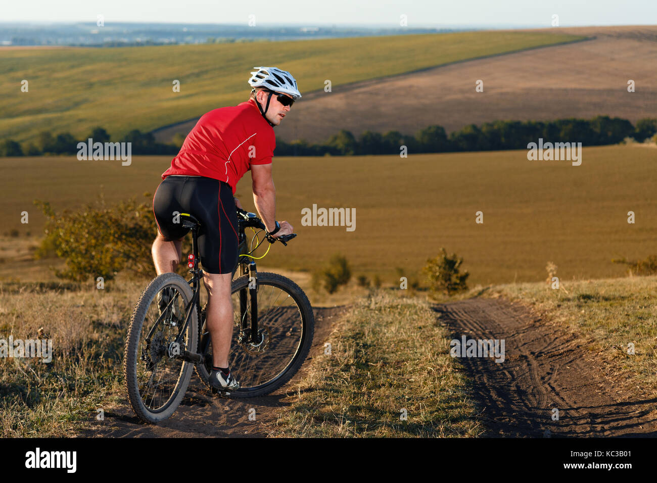 Bike adventure travel photo. Cyclist on the Beautiful Meadow Trail on ...