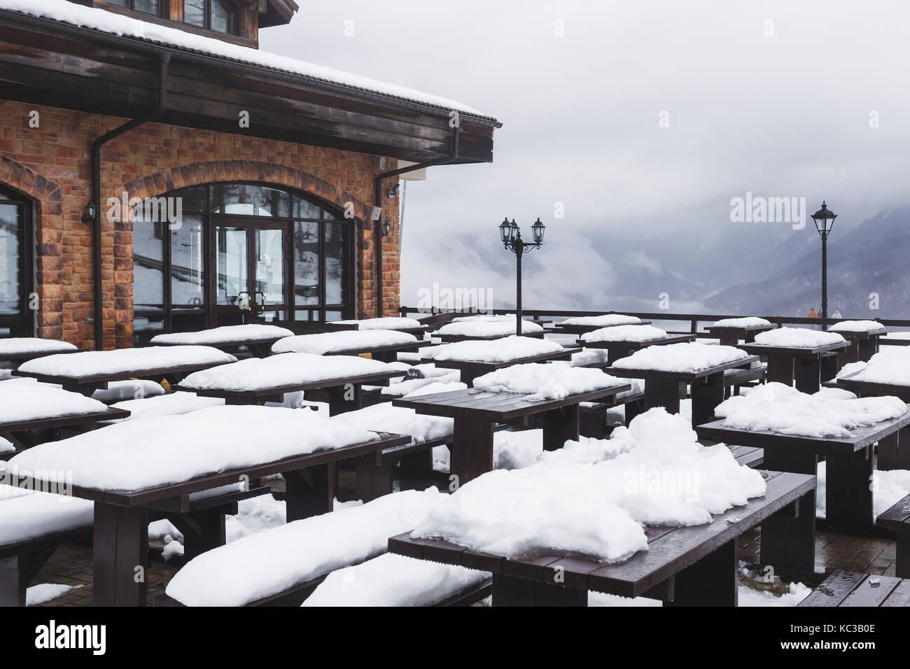 Outdoor wet wooden tables hi-res stock photography and images - Alamy