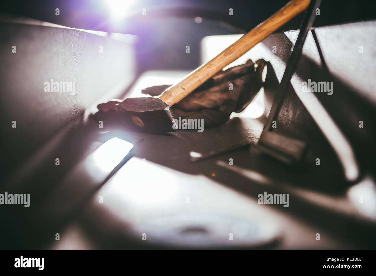 Industrial tool in big metal profile background Stock Photo - Alamy