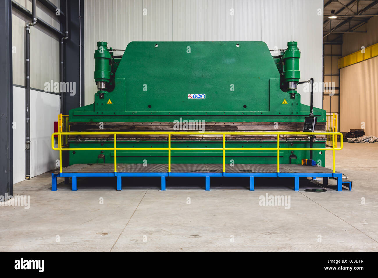 Hydraulic Sheet Metal Press Brake in big industrial hall Stock Photo ...