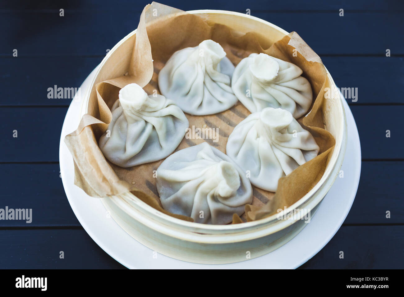 Traditional Georgian dish khinkali Stock Photo - Alamy