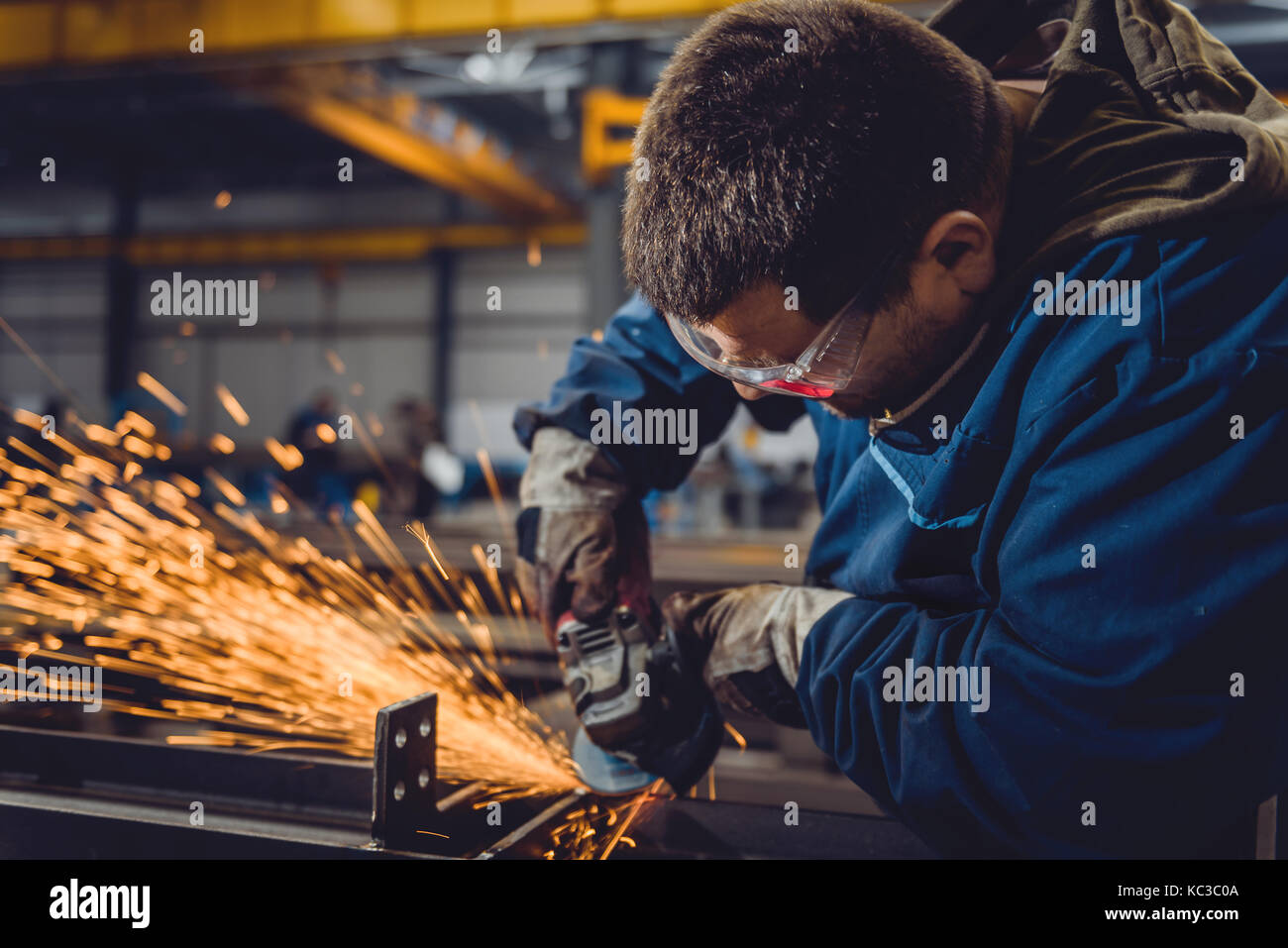 Man working angle grinder hi-res stock photography and images - Alamy