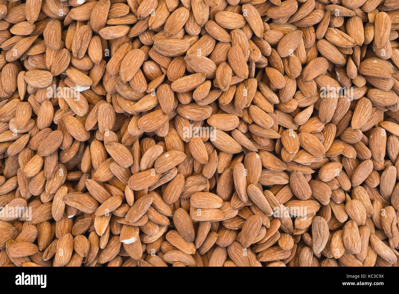 Pile of delicious Peeled almonds for background Stock Photo - Alamy