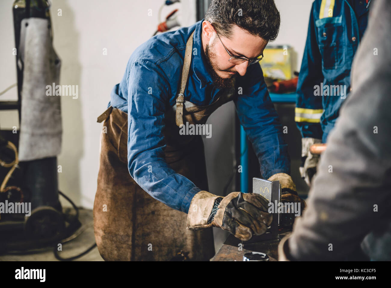 Manual worker checking welding hi-res stock photography and images - Alamy