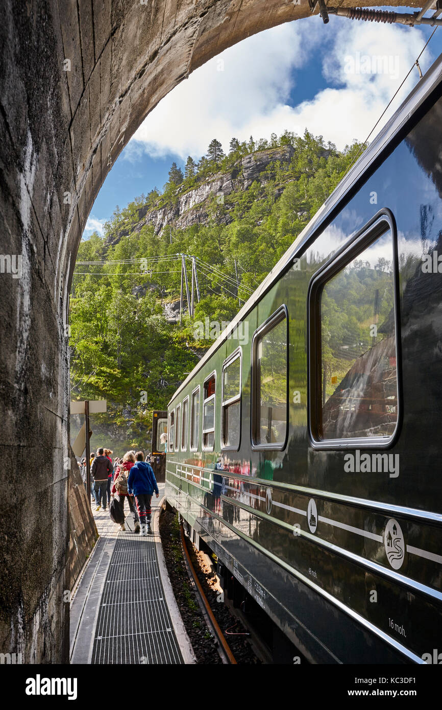 Flam wagon train in Norway inside tunnel . Norwegian tourism highlight ...