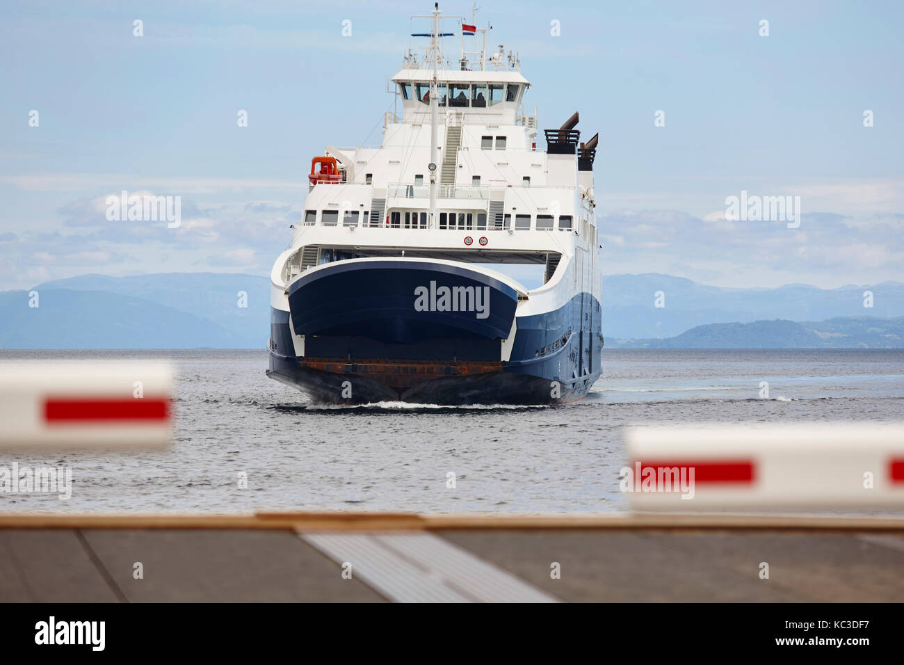 Norwegian car ferry landing at port. Closed barrier. Horizontal Stock ...