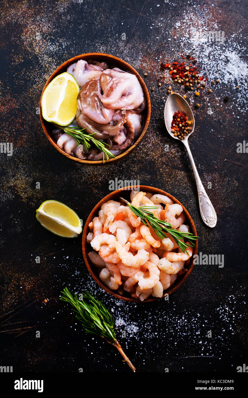 seafood in bowls and on a table Stock Photo - Alamy