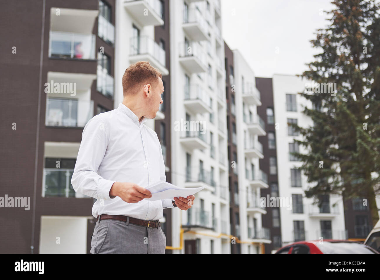 business, building, industry, technology and people concept - smiling ...