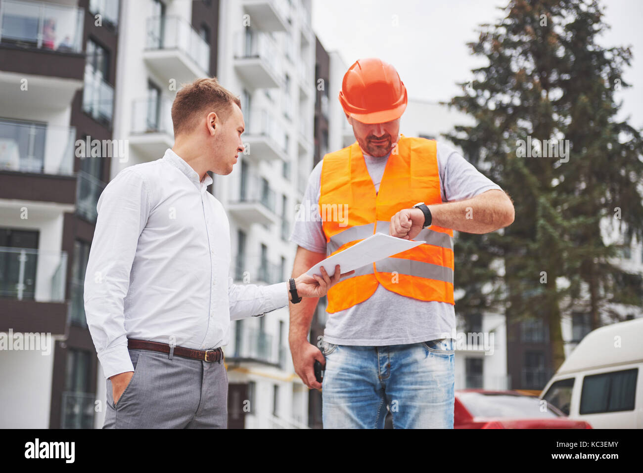 business, building, teamwork and people concept - group of smiling ...