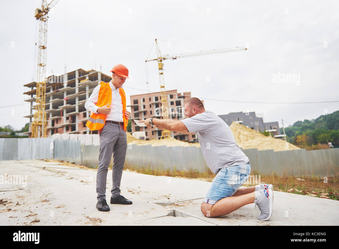 business, building, teamwork and people concept - group of smiling ...