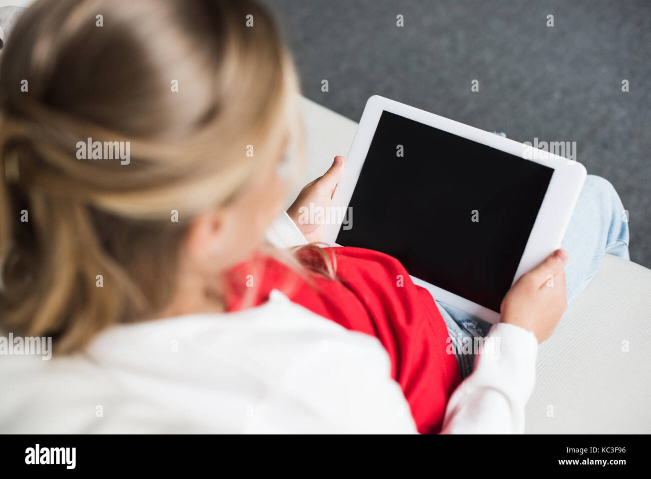 Child tablet rear hi-res stock photography and images - Alamy