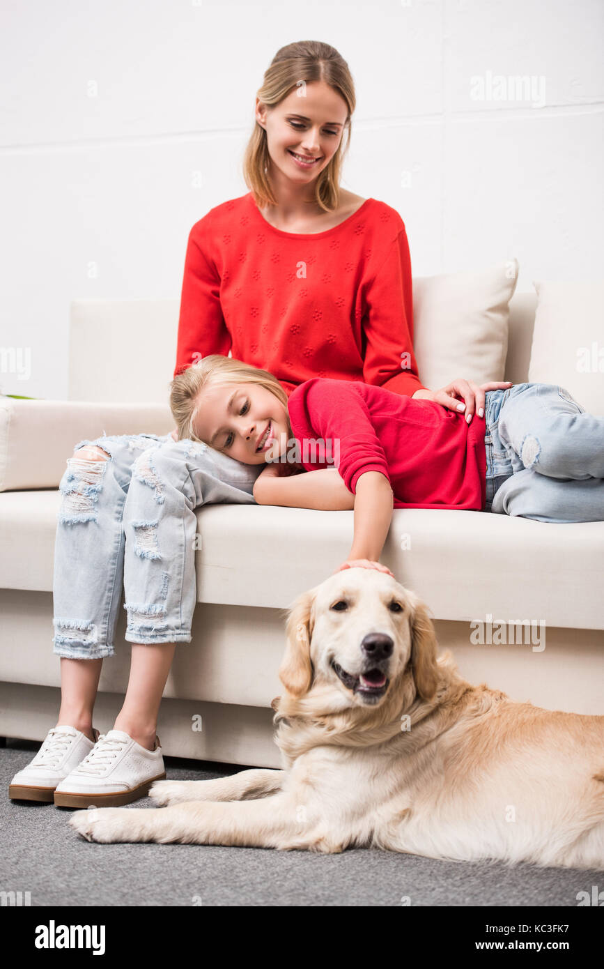 mother and daughter with dog Stock Photo - Alamy