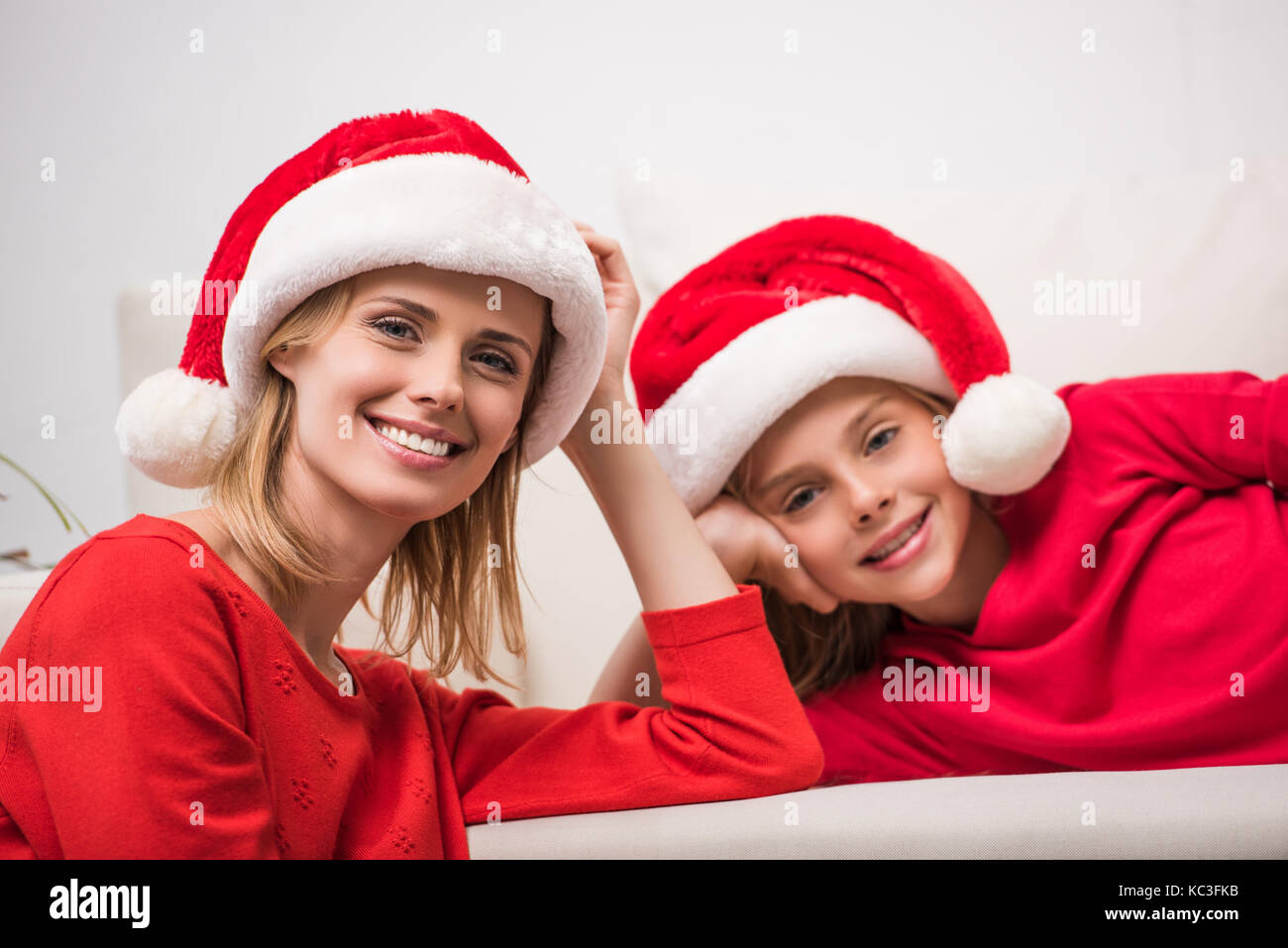 mother and daughter in Santa hats Stock Photo - Alamy