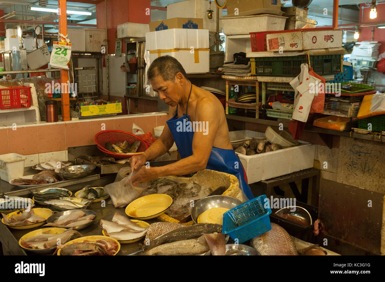 27.07.2017, Singapore, Republic of Singapore, Asia - A fish monger at ...