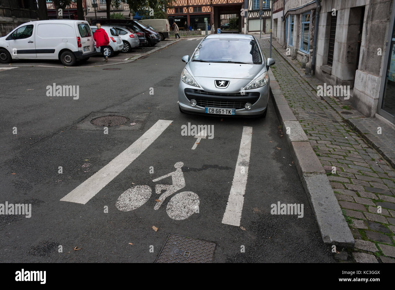 Parked car blocking designated cycle lane in Rouen, Normandy, France ...