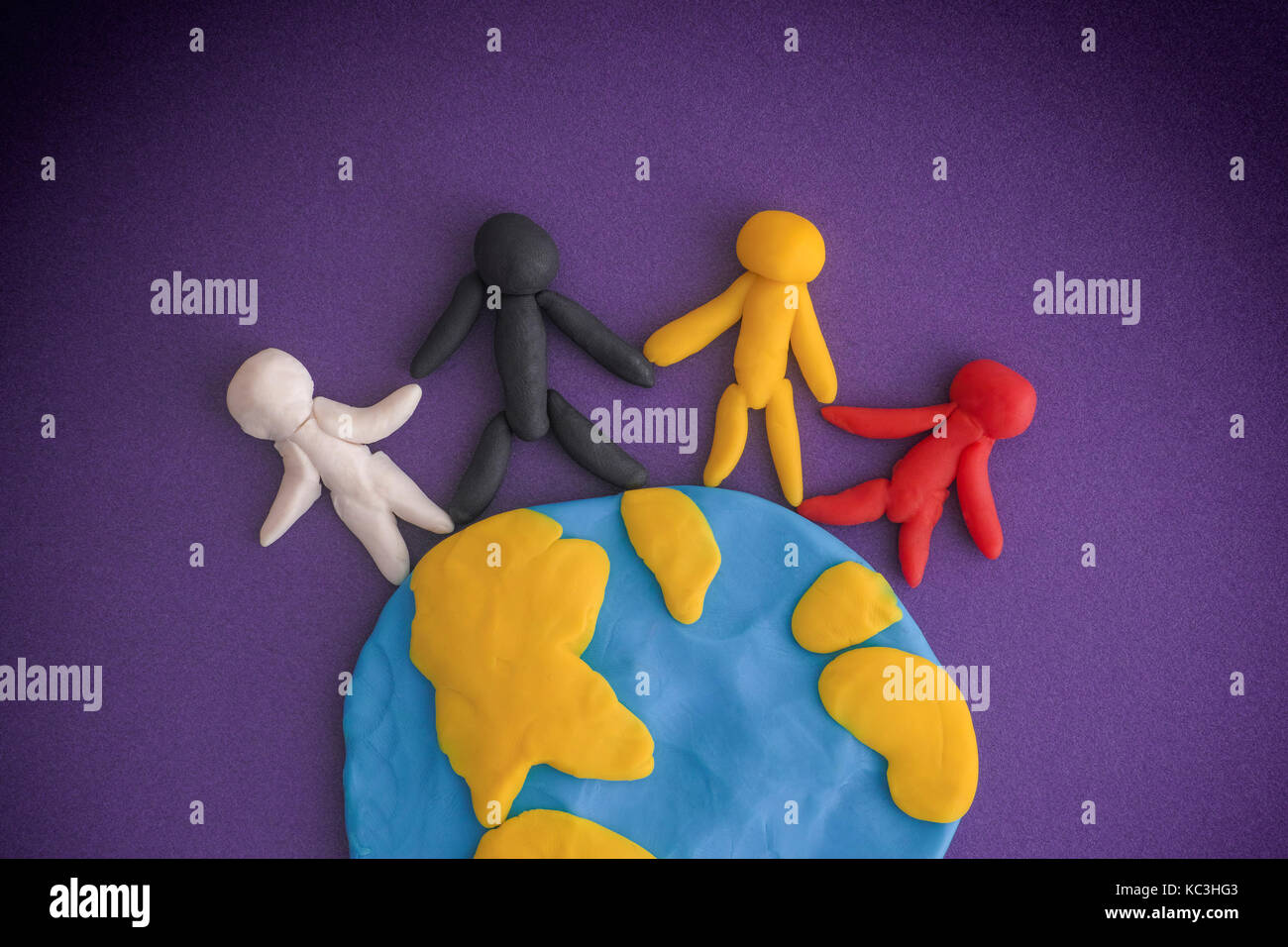 Group of people around the world. People and Earth are made out of play ...