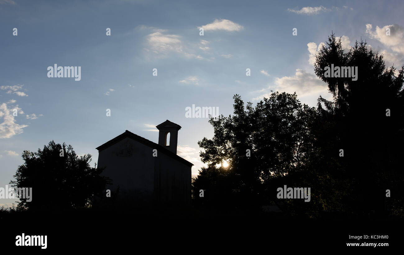 Countryside church at sunset Stock Photo - Alamy