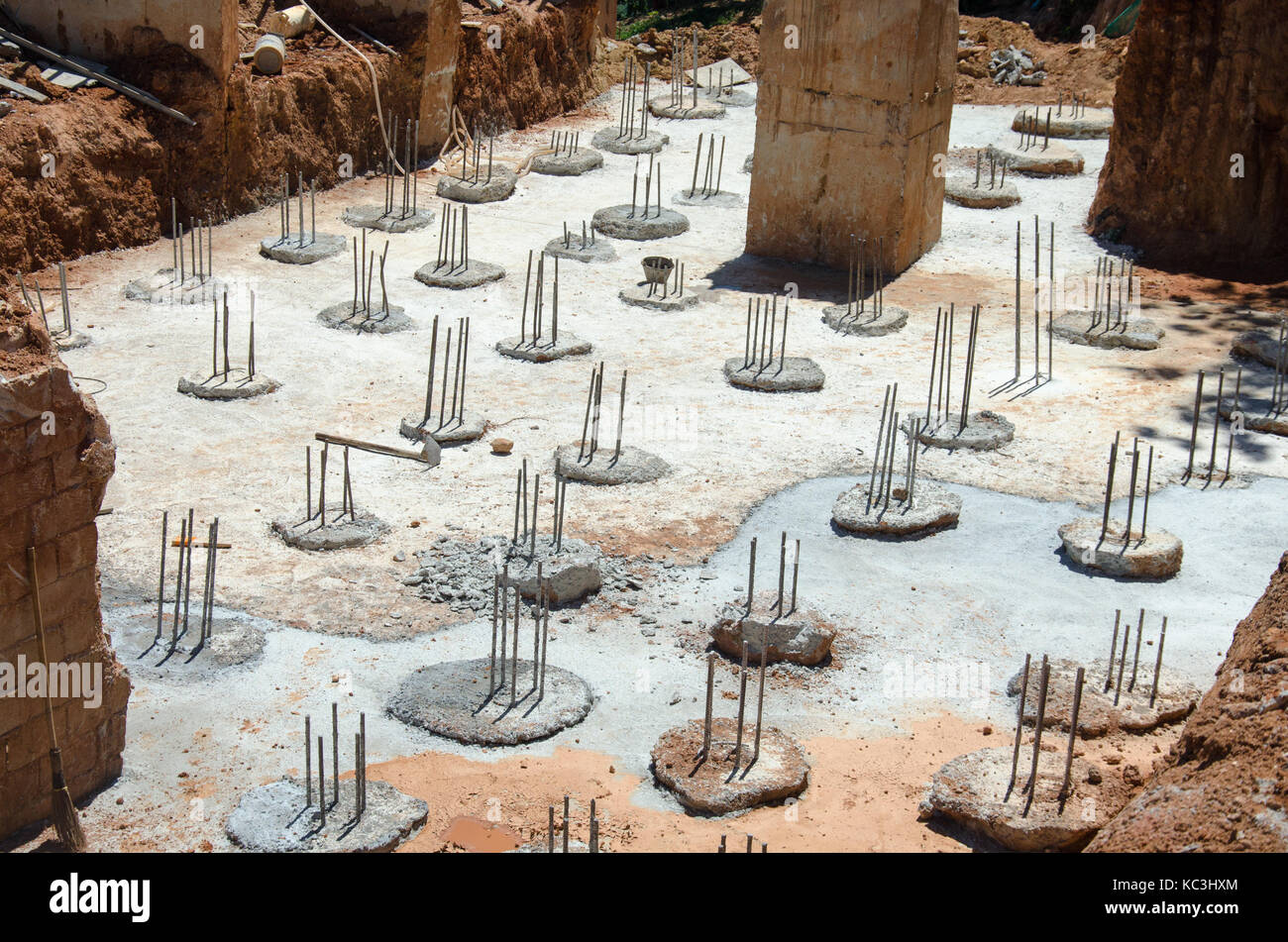 Steel structure and concrete base building Stock Photo - Alamy