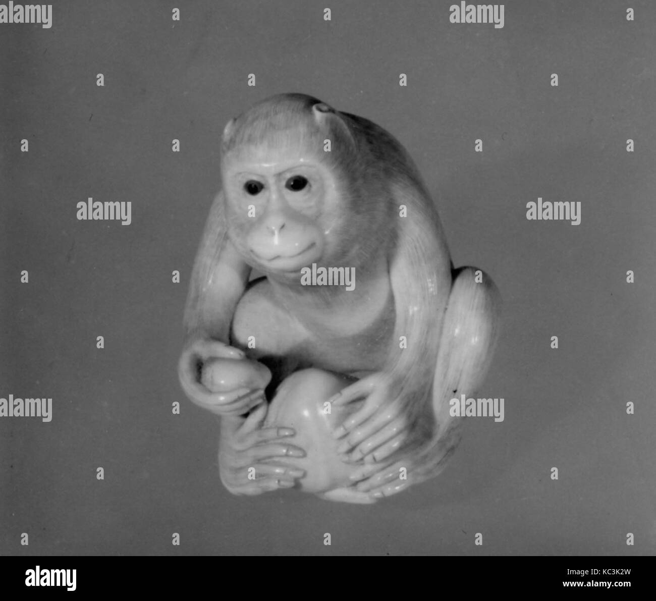 Netsuke of Seated Monkey with Persimmon, 19th century Stock Photo - Alamy