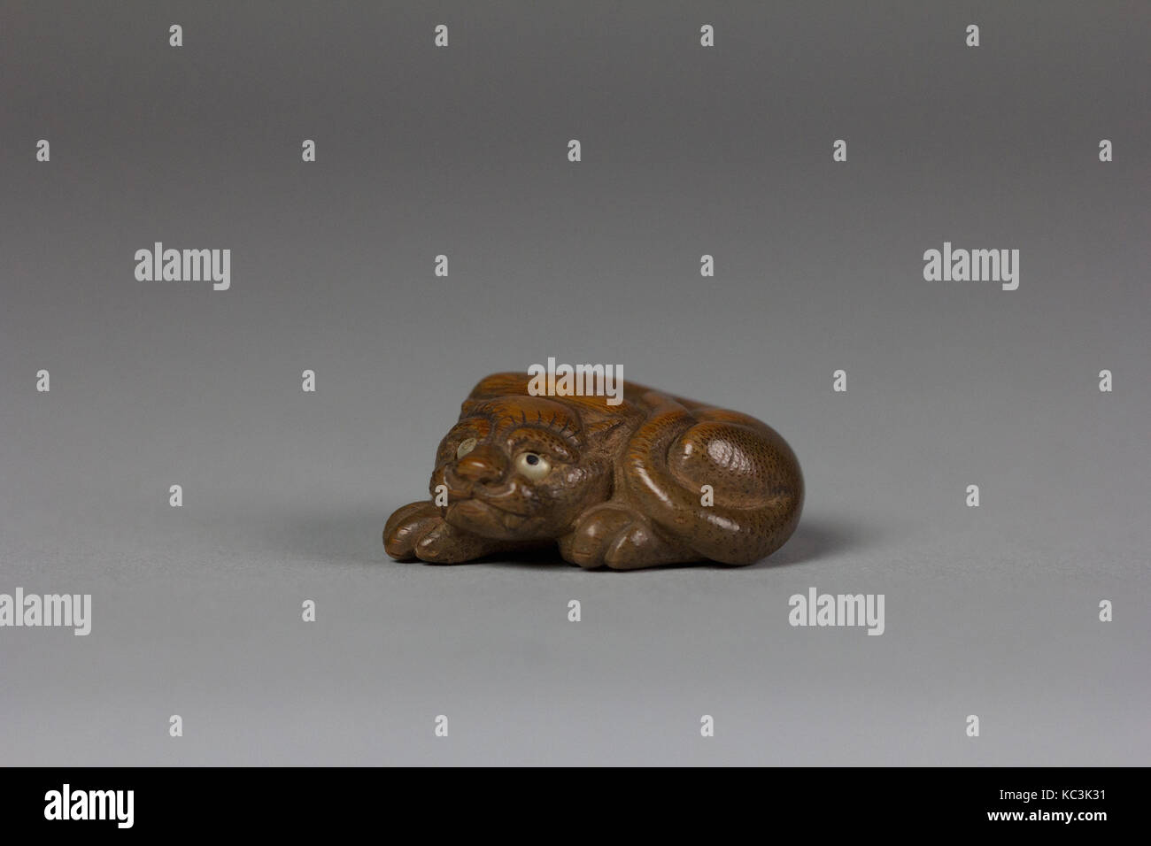 Netsuke of Recumbent Tiger, 19th century, Japan, Boxwood, L. 1 1/3 in ...