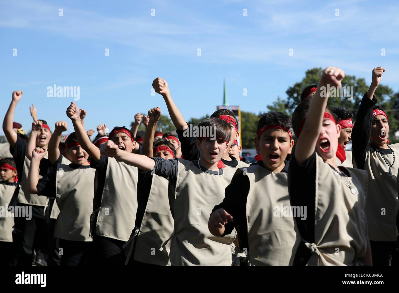 Shiite Muslims participate in a rally on Ashura, the tenth day of ...