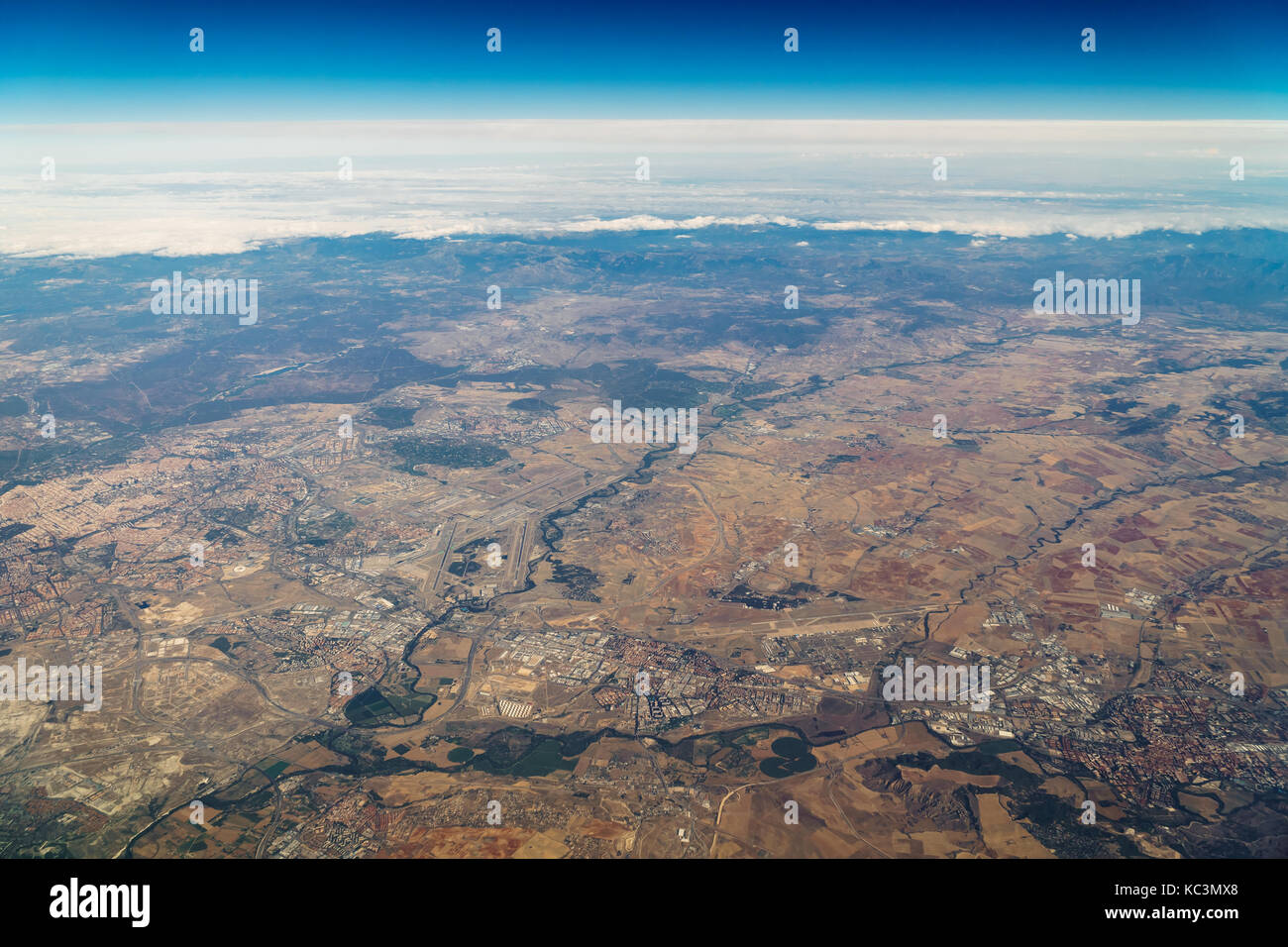Airplane View Of City And Earth Horizon Stock Photo - Alamy