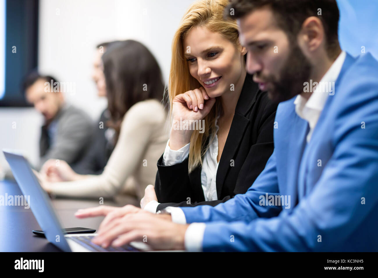 Portrait of business couple in conference room Stock Photo - Alamy