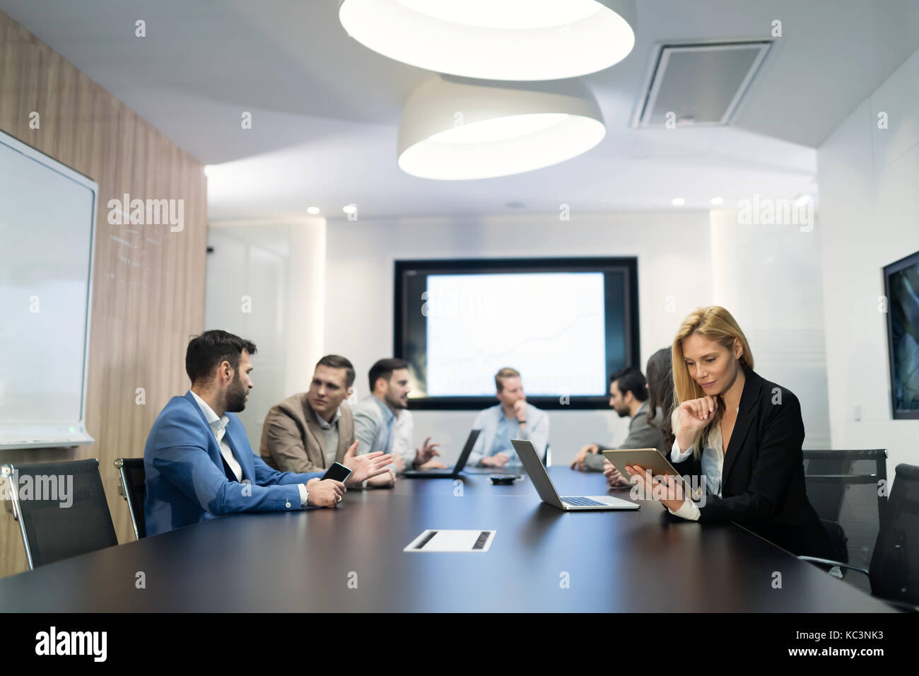 Picture of businesspeople having meeting in conference room Stock Photo ...