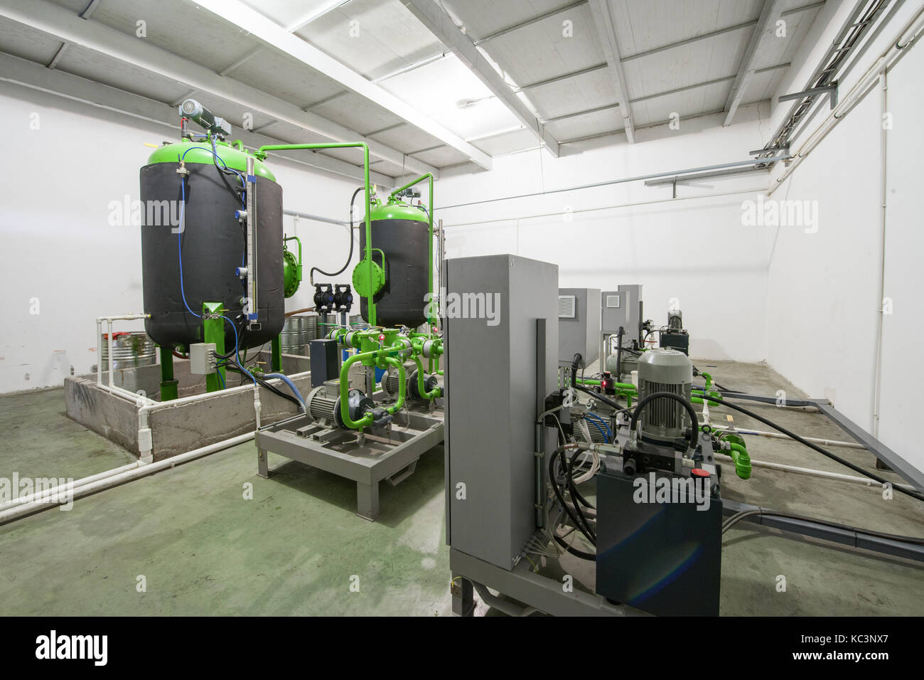 workshop with containers and tanks for the production of polyurethane ...