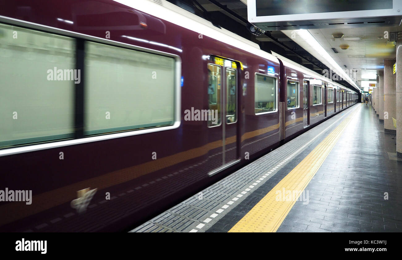 Old and dirty train platform or underground subway station in Osaka ...