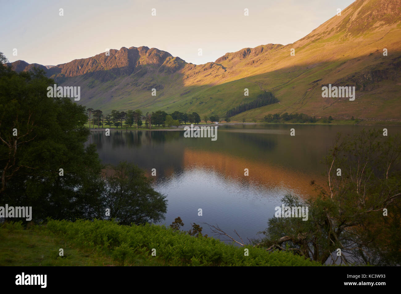 Rich colours of sunrise over Buttermere in the Lake District National ...