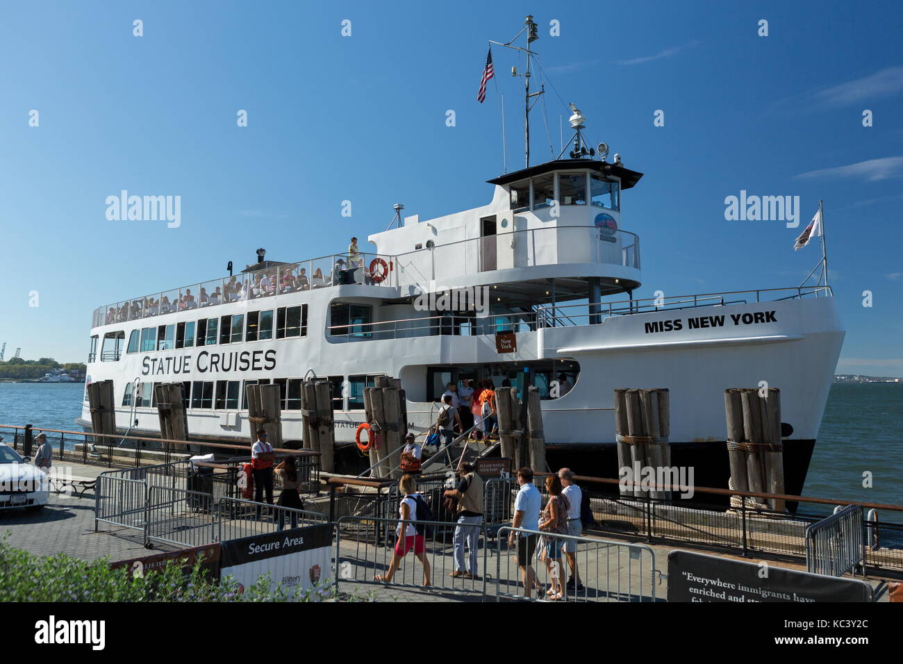 Ferries take people to the Statue of Liberty in Battery Park, New York ...