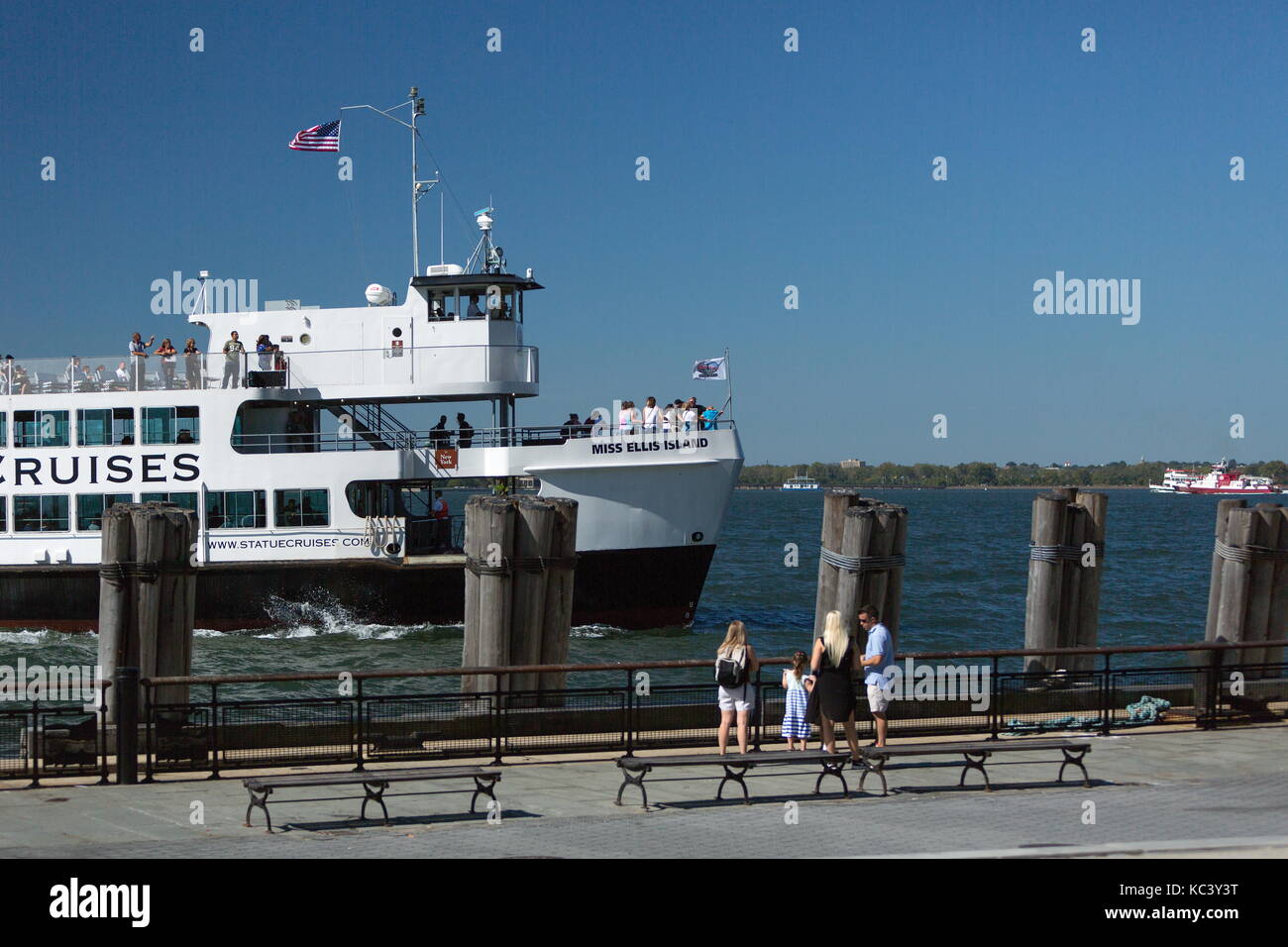Ferries take people to the Statue of Liberty in Battery Park, New York ...