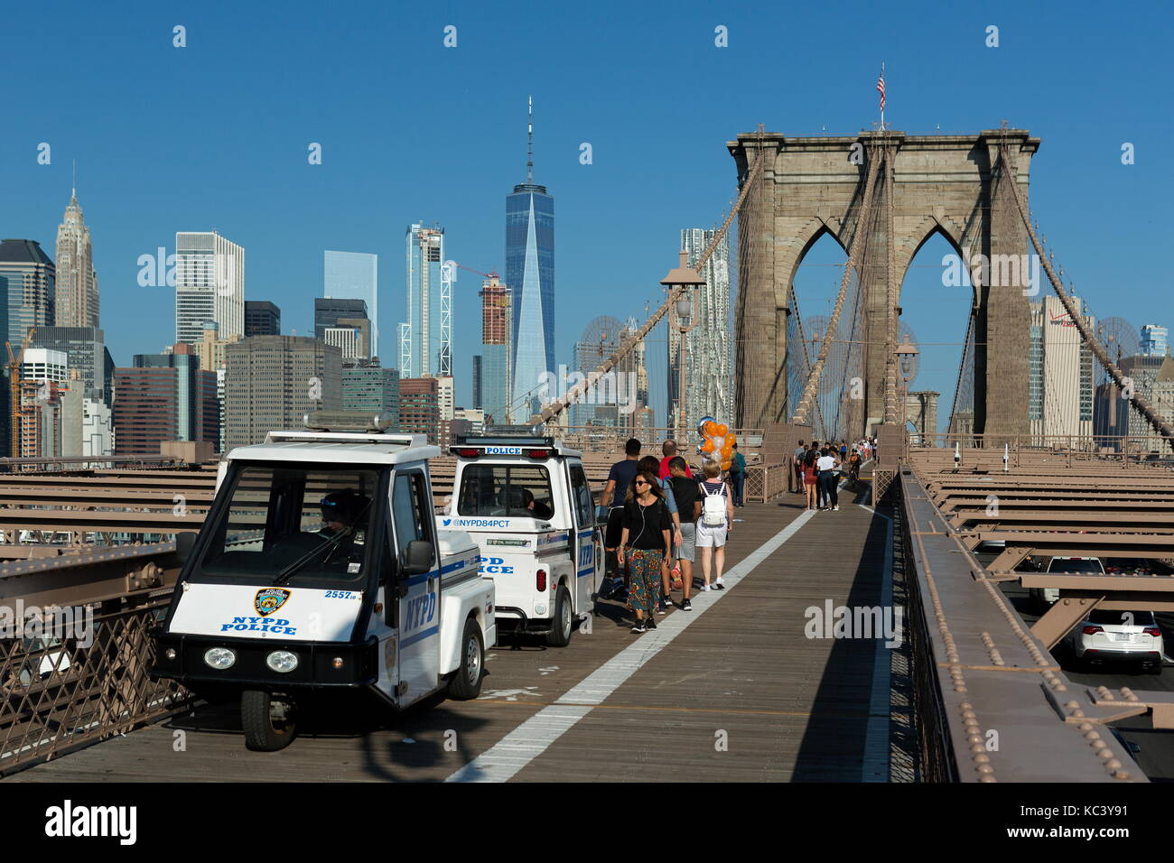 NYPD patrols along the Brooklyn Bridge in Brooklyn, New York on ...