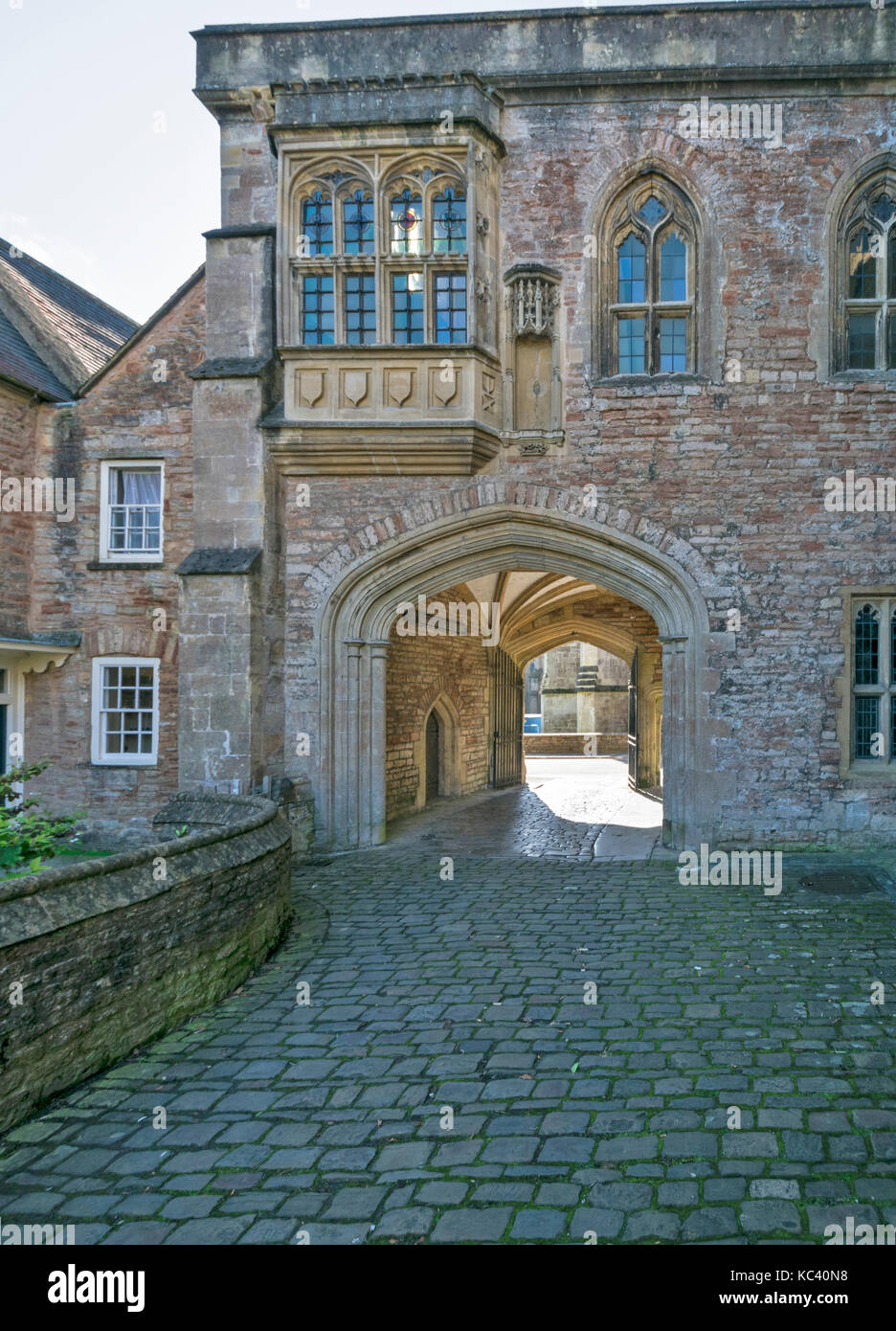 WELLS CITY SOMERSET ENGLAND CATHEDRAL A SUNLIT VICARS HALL AND GATEWAY ...