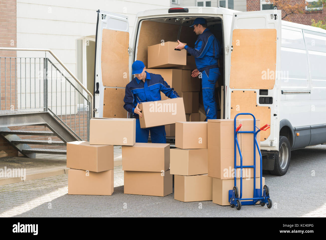 Unloading Delivery Van Stock Photos & Unloading Delivery Van Stock ...