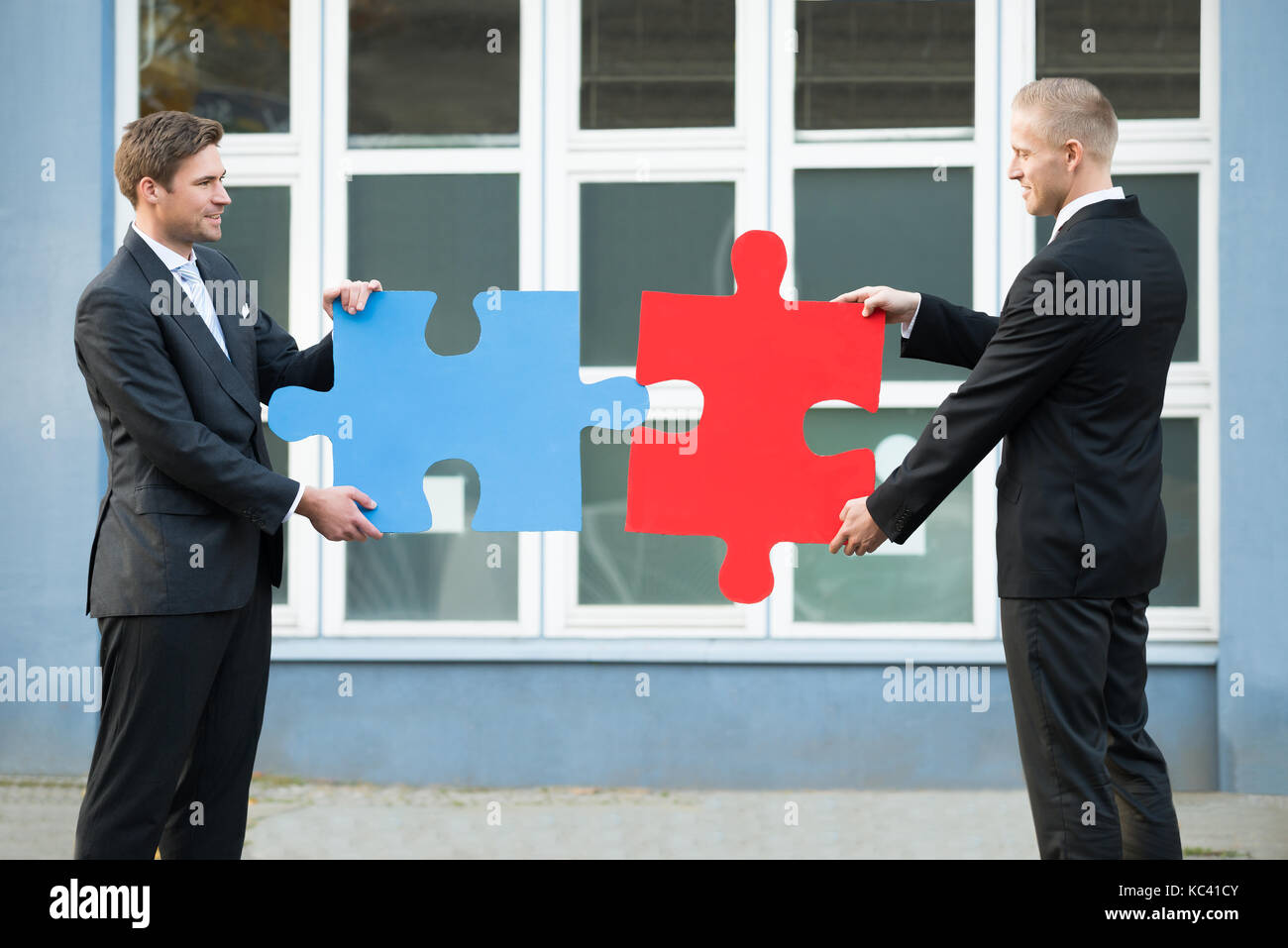 Side profile of two men standing hi-res stock photography and images ...