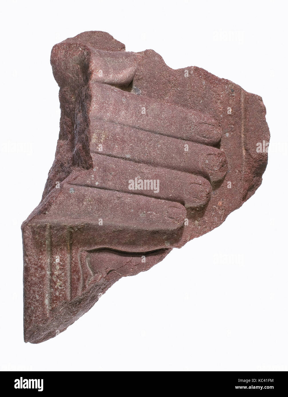 Hand from a stelophorous statue with part of the Horus name of ...