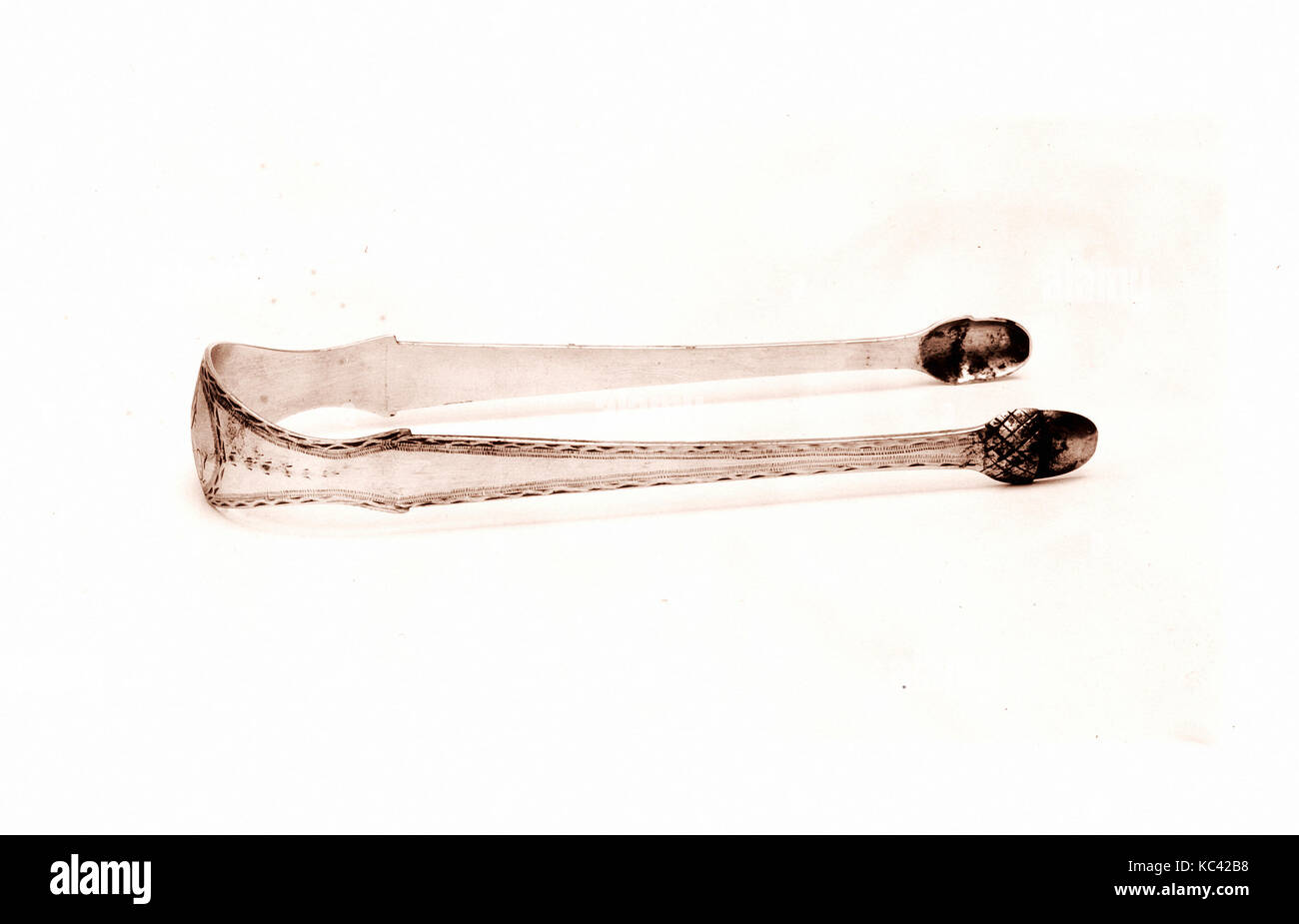 Silver tongs hi-res stock photography and images - Alamy