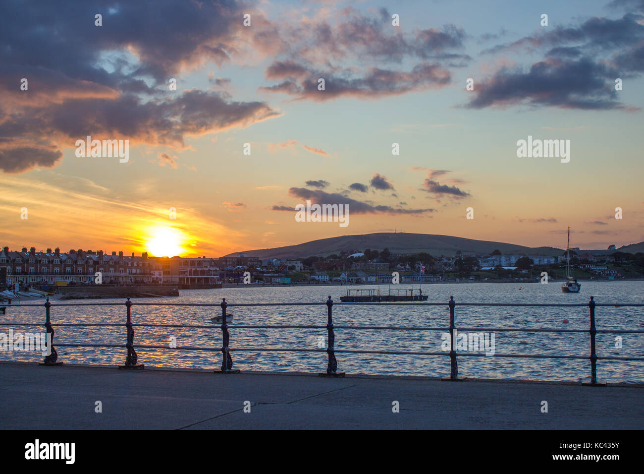 Beautiful sunset over seafront of Swanage, Dorset Stock Photo - Alamy