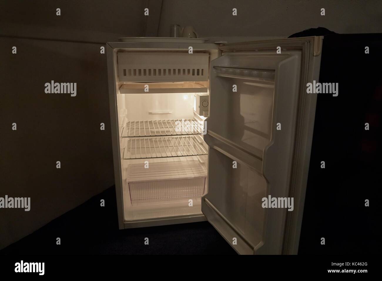 Empty refrigerator in the dark Stock Photo - Alamy
