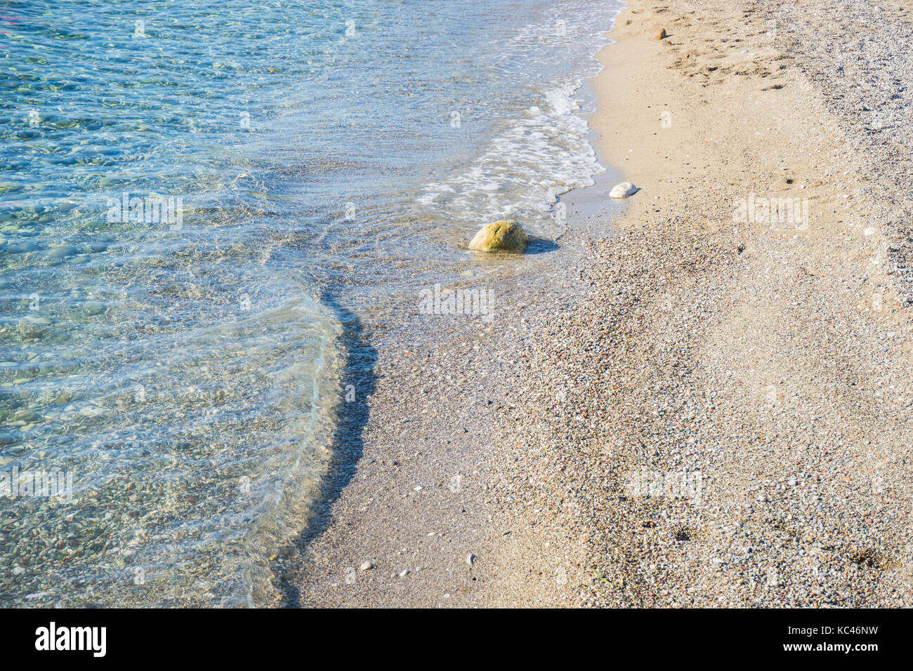 Summertime relax on the sand beach with sea waves Stock Photo - Alamy