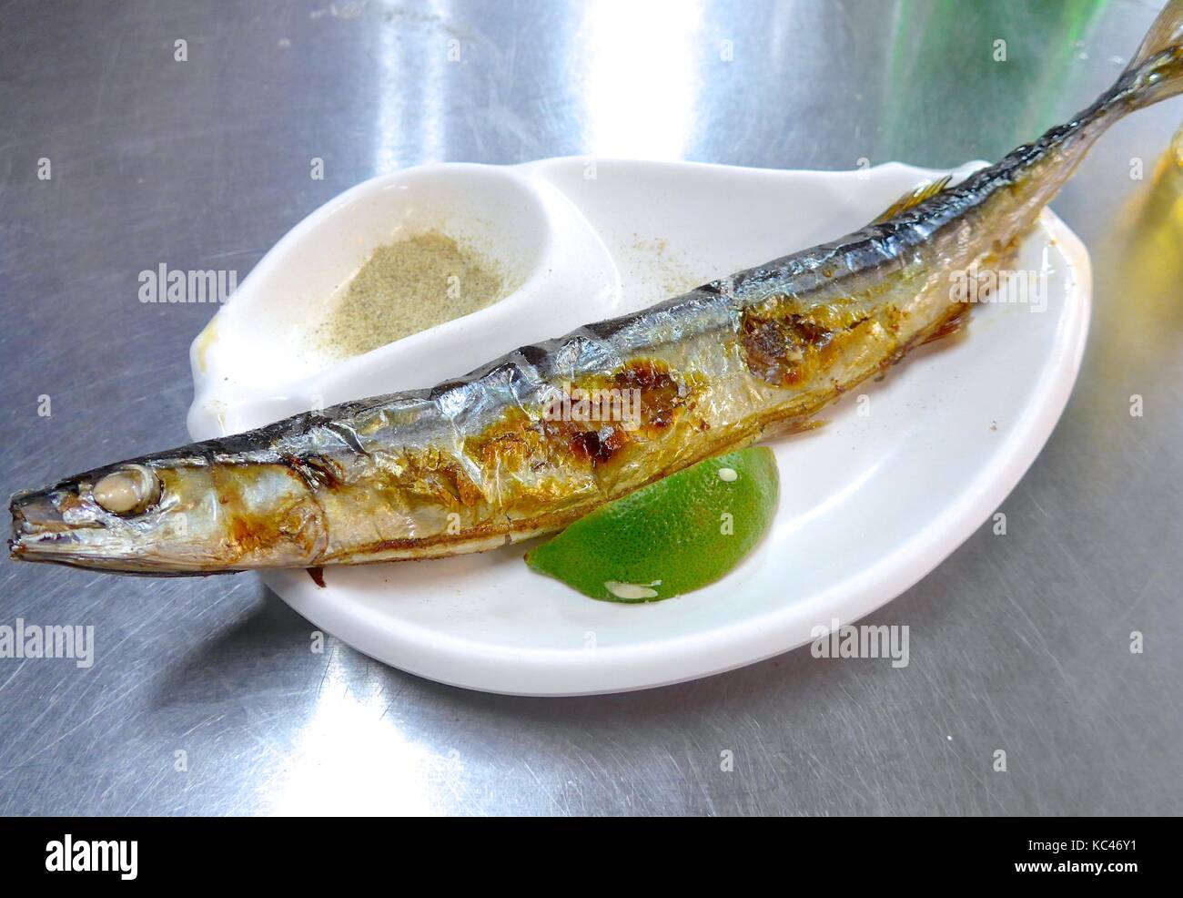 Grilled saury fish closeup Stock Photo - Alamy