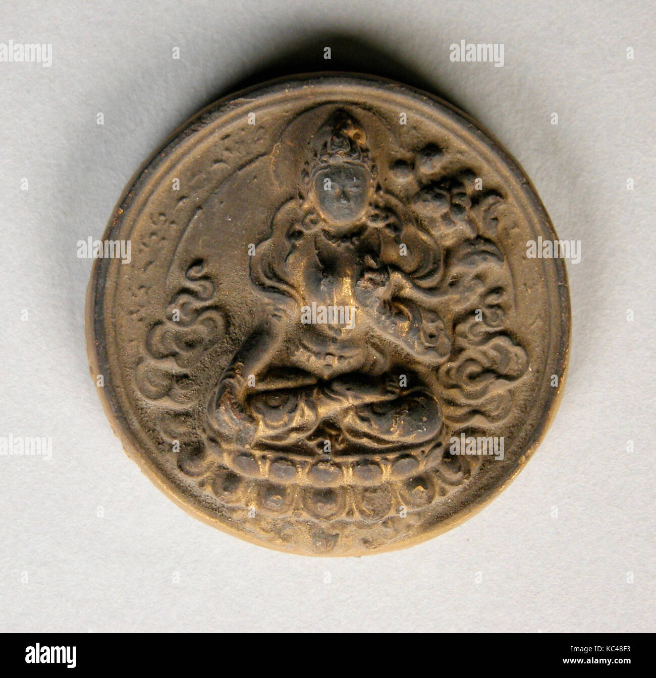Votive Plaque with White Taras, ca. 1368–1643, Tibet, Gray clay, Diam ...