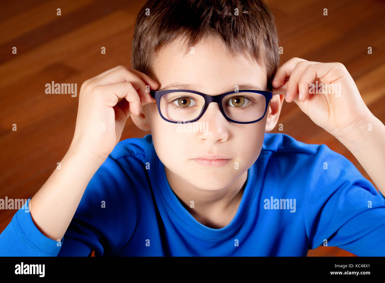 Beautiful boy with glasses Stock Photo - Alamy