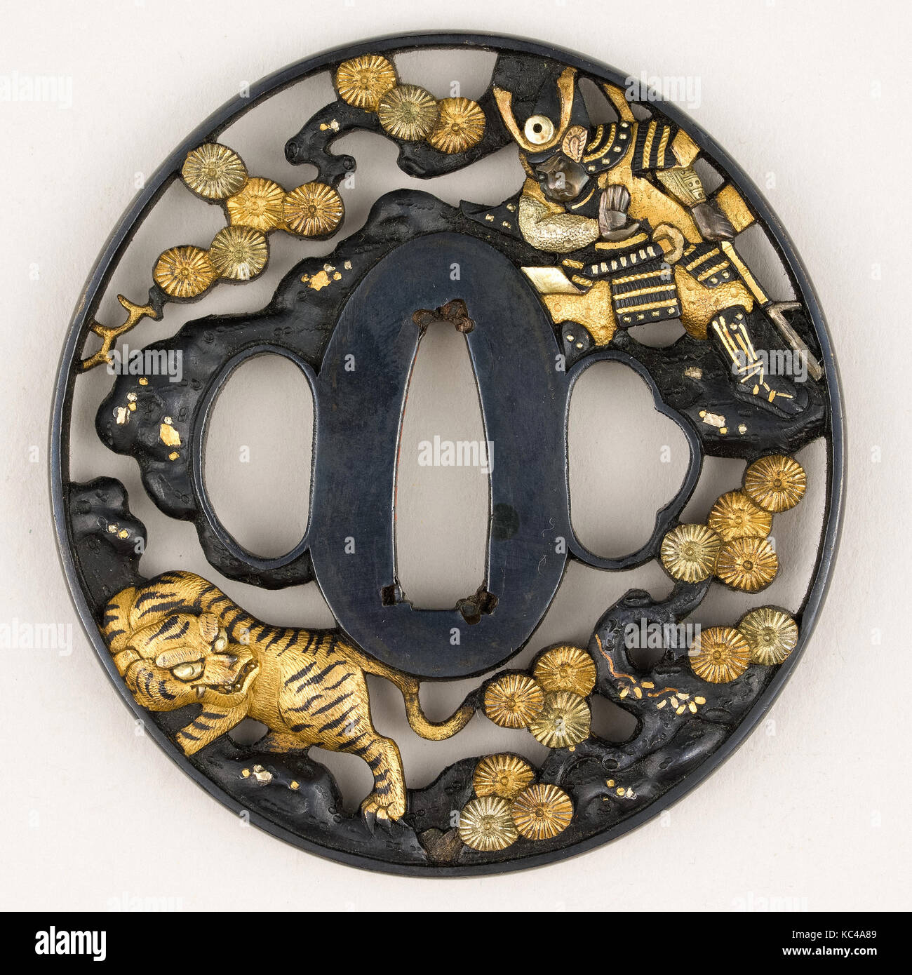 Sword Guard (Tsuba), 18th century, Japanese, Iron, copper-gold alloy ...