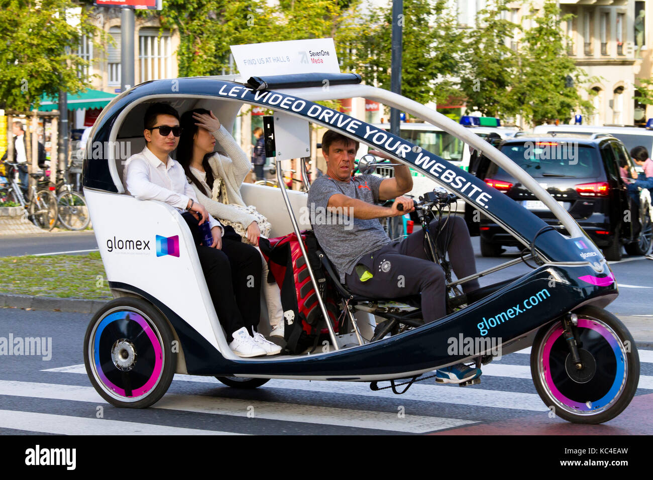Germany, Cologne, rickshaw for sightseeing at the Heumarkt Deutschland ...