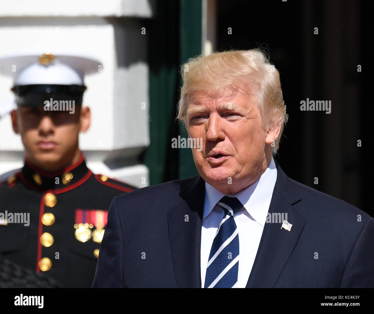 Washington, USA. 2nd Oct, 2017. U.S. President Donald Trump (R) attends ...