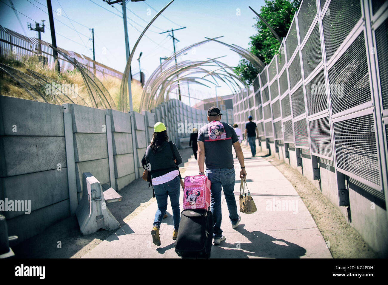 San Ysidro, CA, USA. 9th June, 2017. Pedestrians walk towards the entry ...